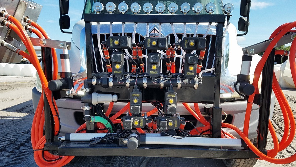 CCI - Custom Roadside Spray Trucks | Single & Dual Long Reach Boom Options